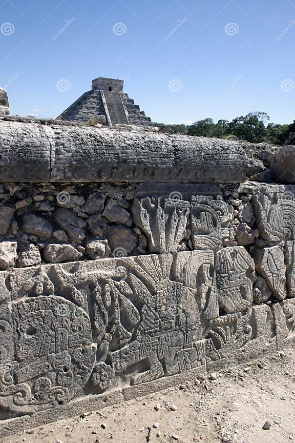 Maya Hieroglyphs with the Great Pyramid in the Background Stock Photo ...
