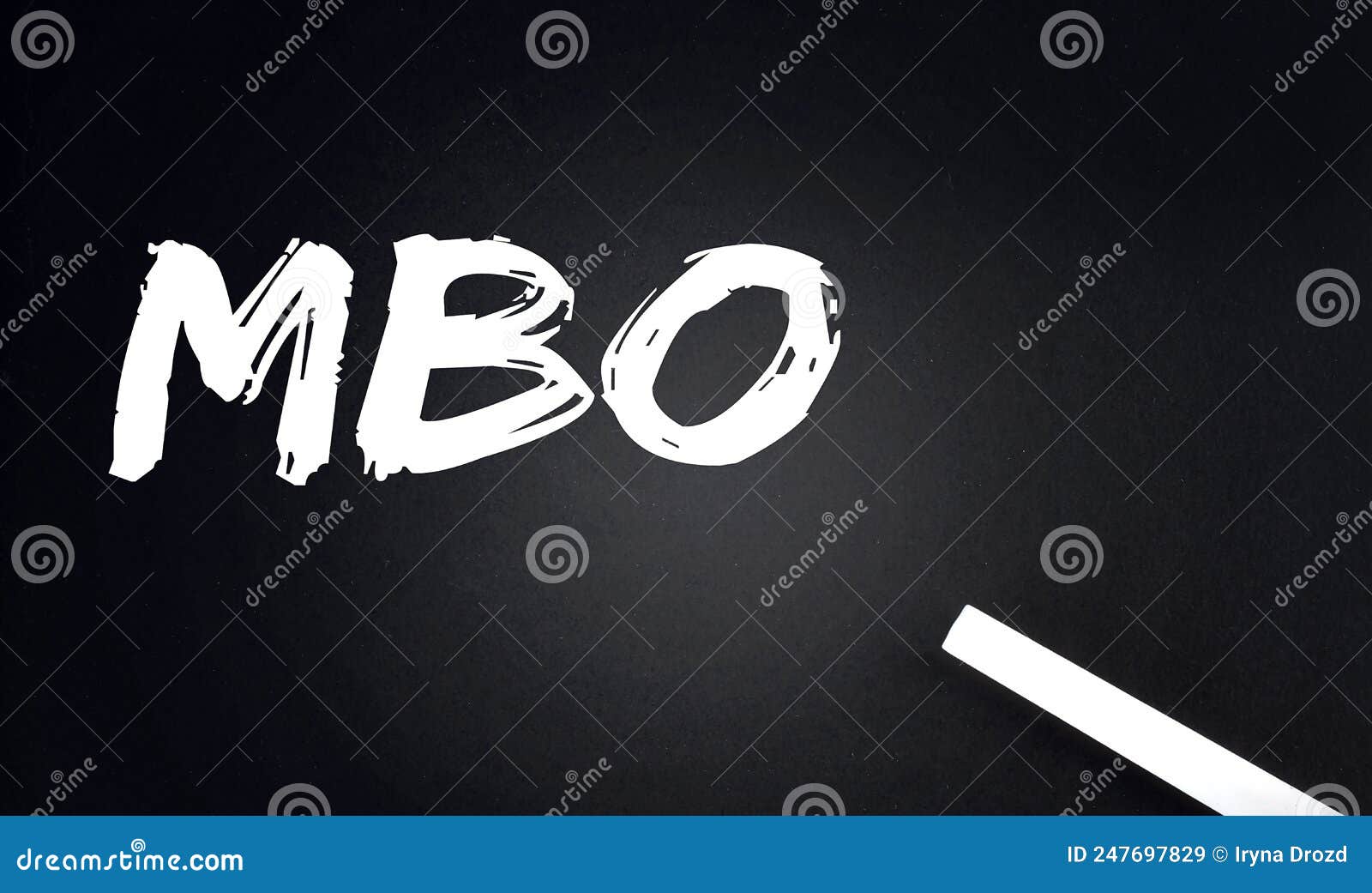 MBO Management by Objectives Text on Black Chalkboard with a Piece of ...