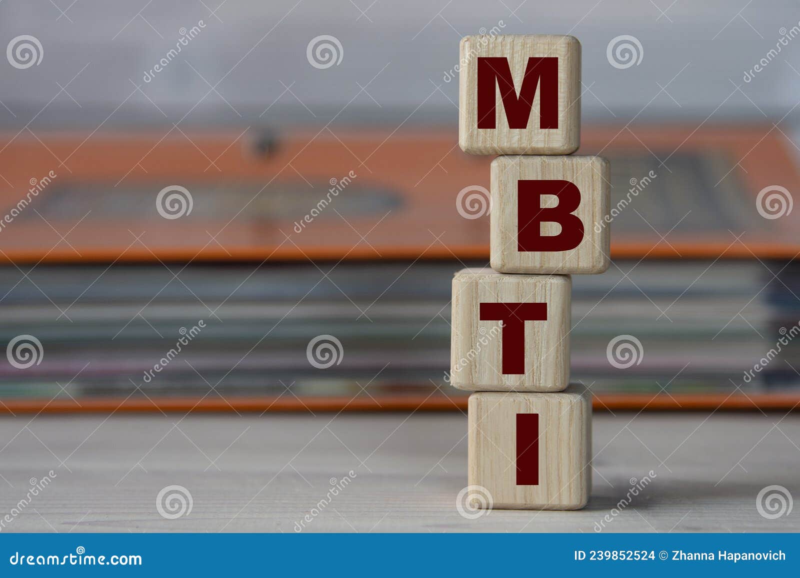 MBTI - Acronym on Wooden Cubes on the Background of a Folder with ...