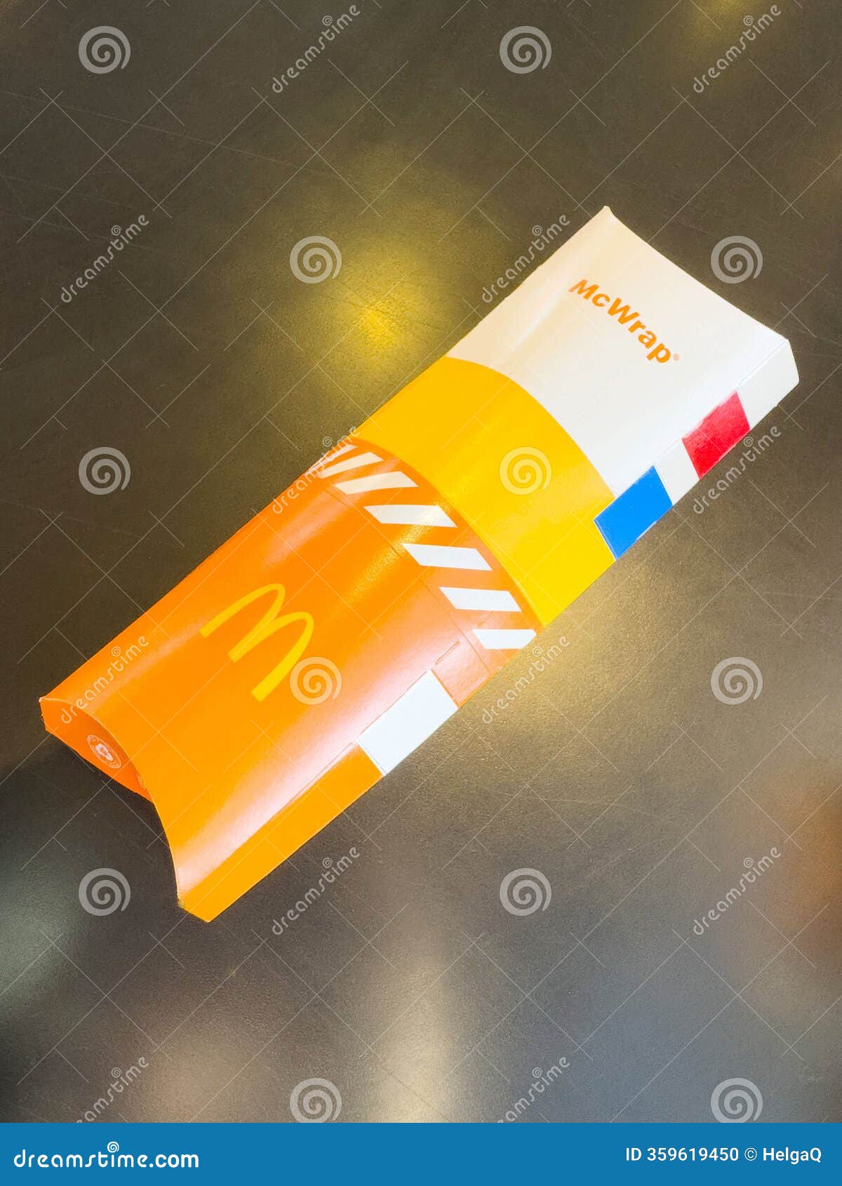 Mcdonald S Mcwrap Package on Dark Surface with Colorful Design ...