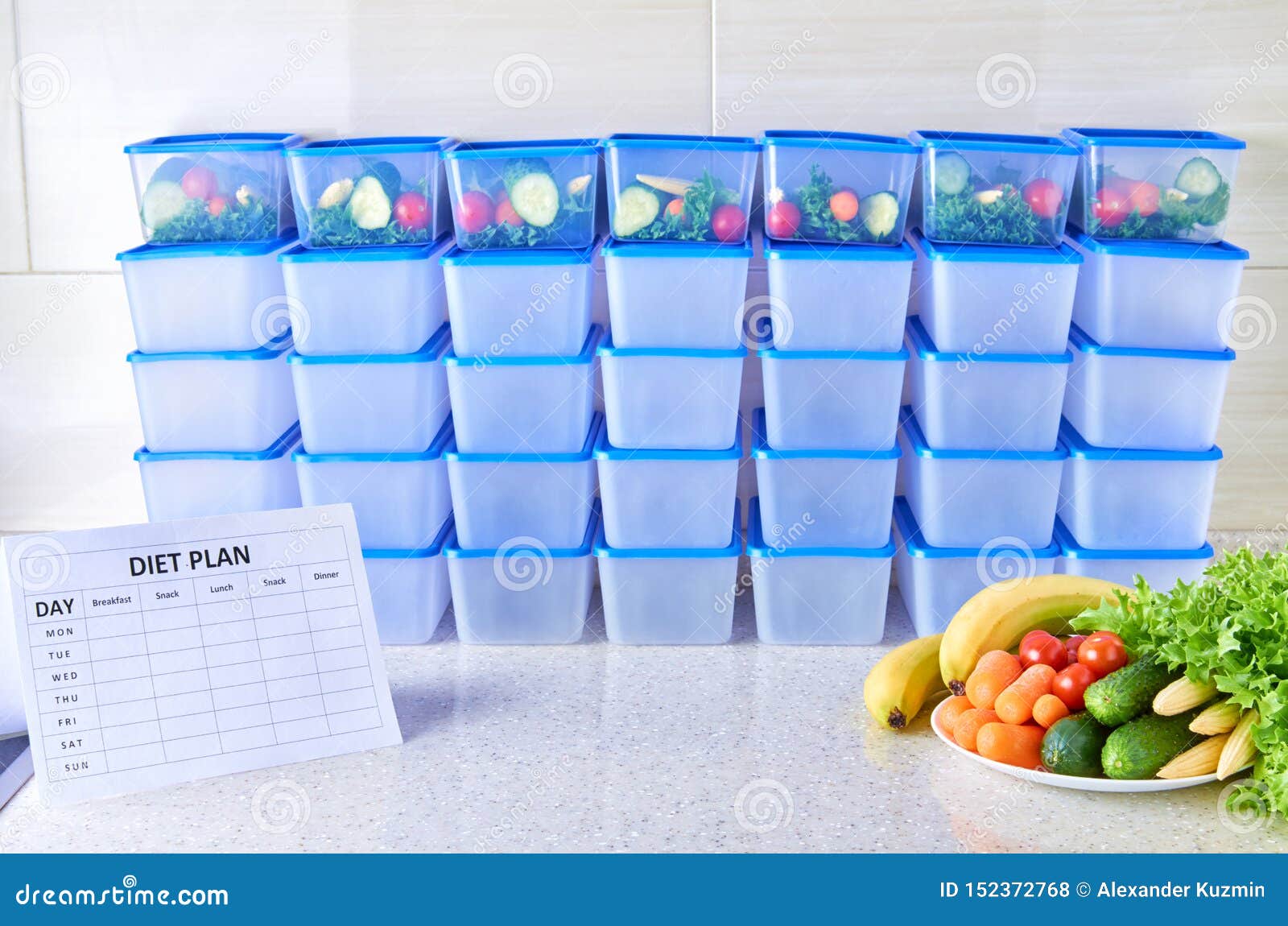 A Meal Plan for a Week on a White Table among Set of Plastic Containers ...