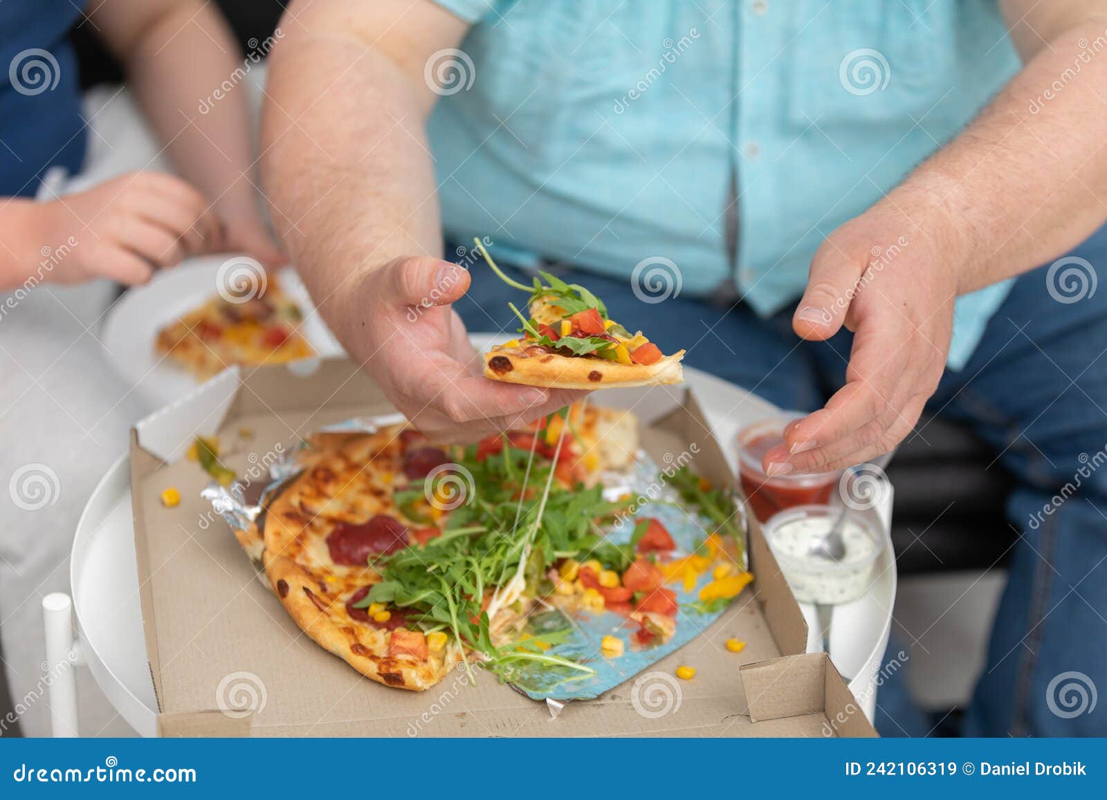 Two People Divide Pieces of Pizza between Them. Stock Image - Image of ...