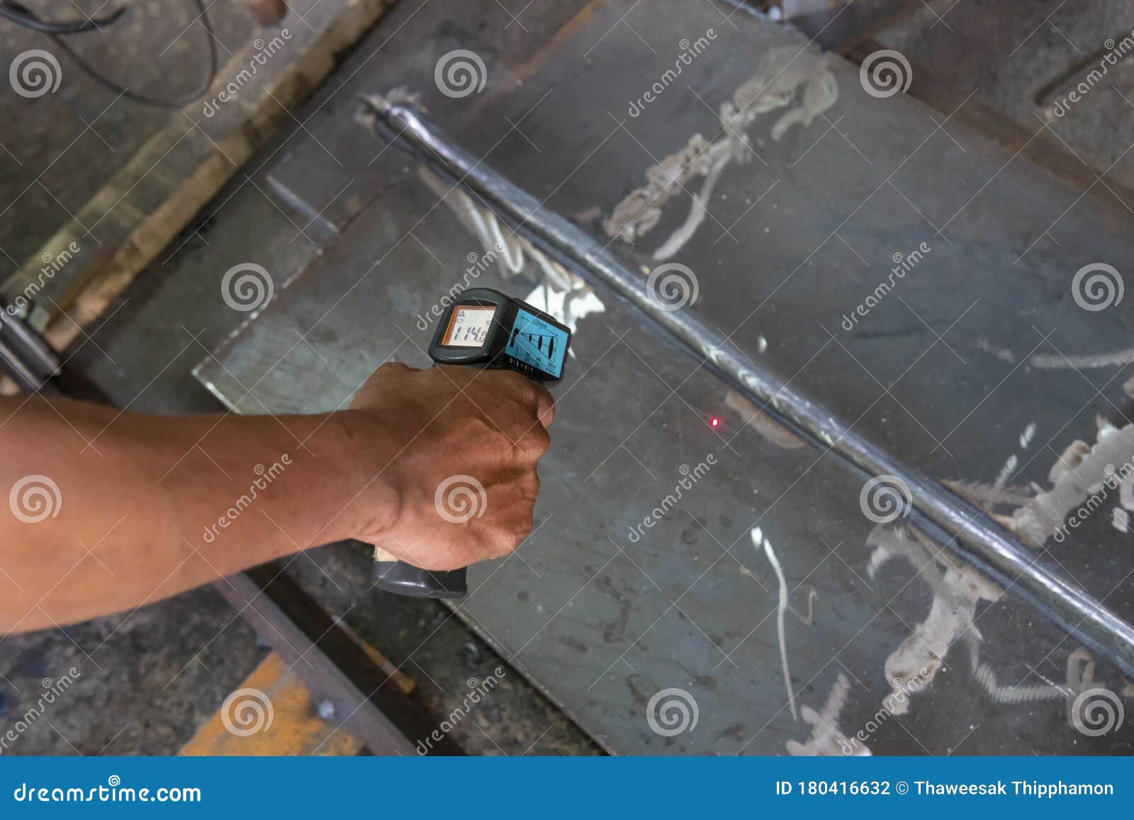 Measure Interpass Temperature with Infrared Thermometer Stock Photo ...