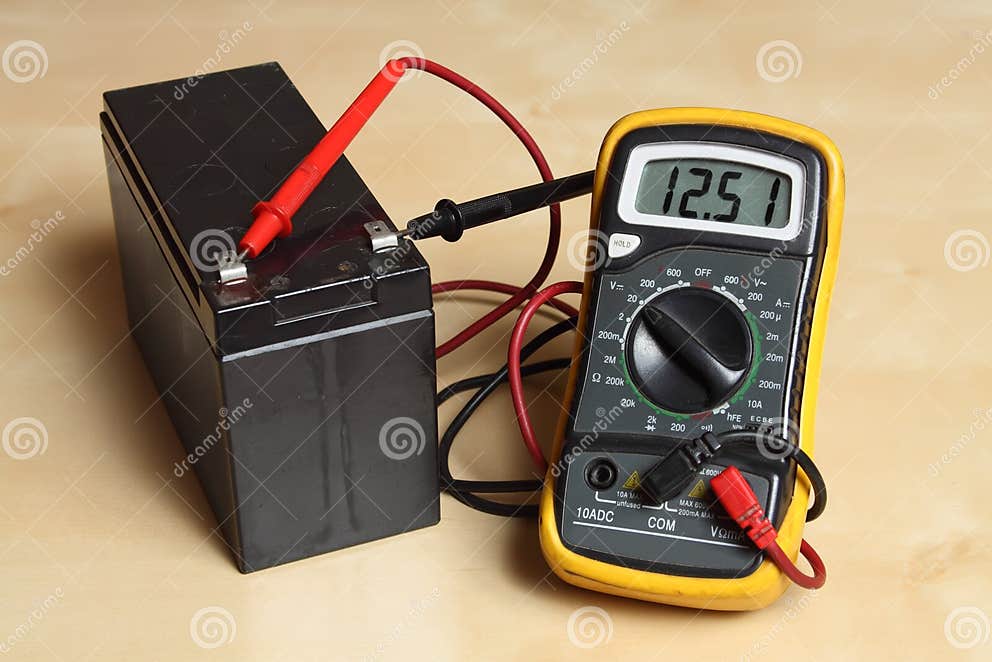 Measure the Voltage at the Battery. Stock Image - Image of measuring ...