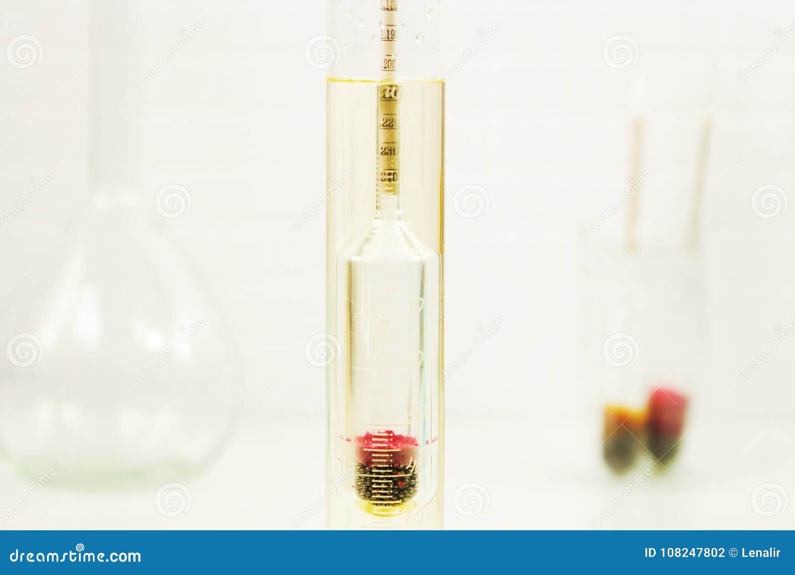 Measurement of Solution Density with a Hydrometer Stock Photo - Image ... Measurement of Solution Density with a Hydrometer Stock Photo - Image ...