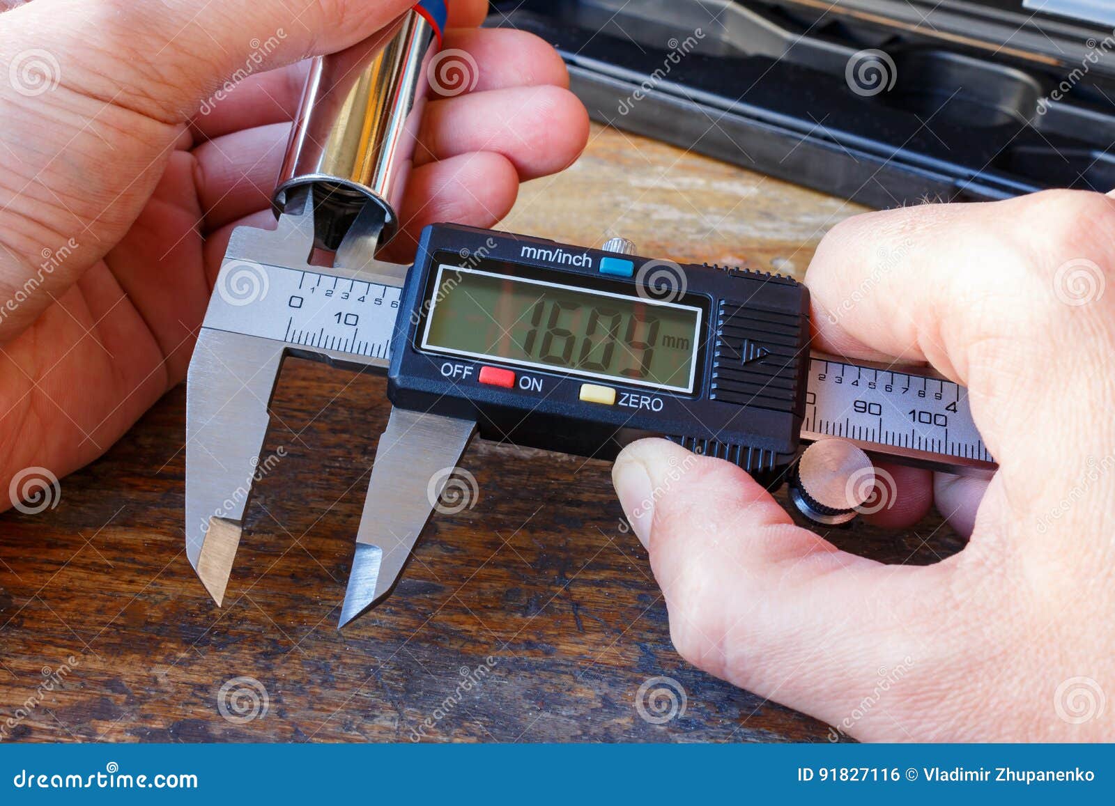 Measurement of the Spanner Head with an Electronic Caliper Stock Photo ...