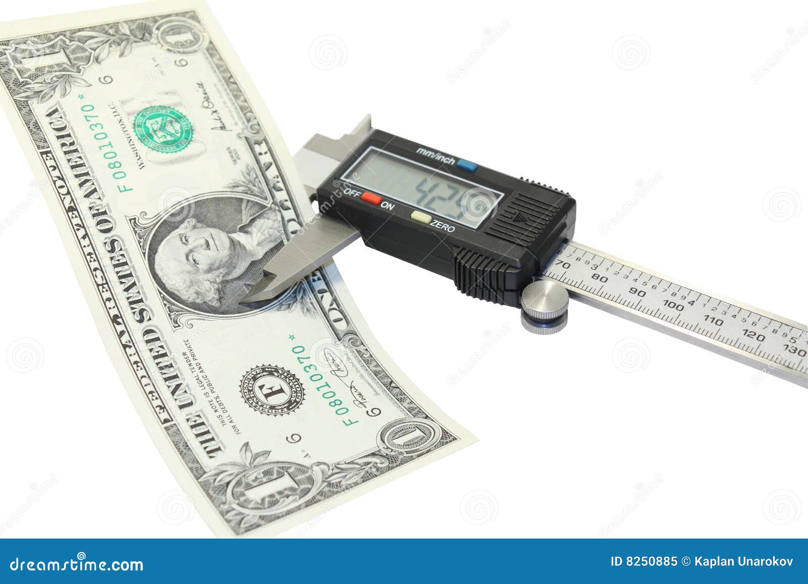 Measurement Of Thickness Of Dollar Picture. Image: 8250885