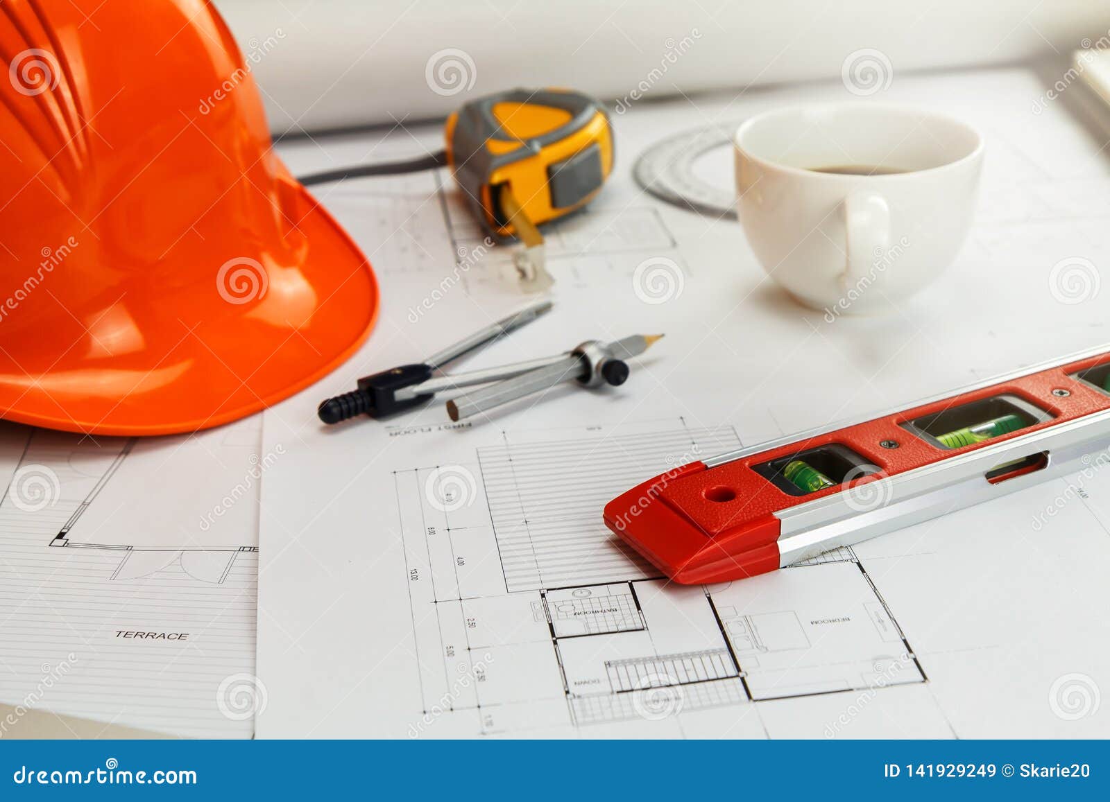 Measurement Tool with Helmet and Coffee on Blueprint, Architectural ...
