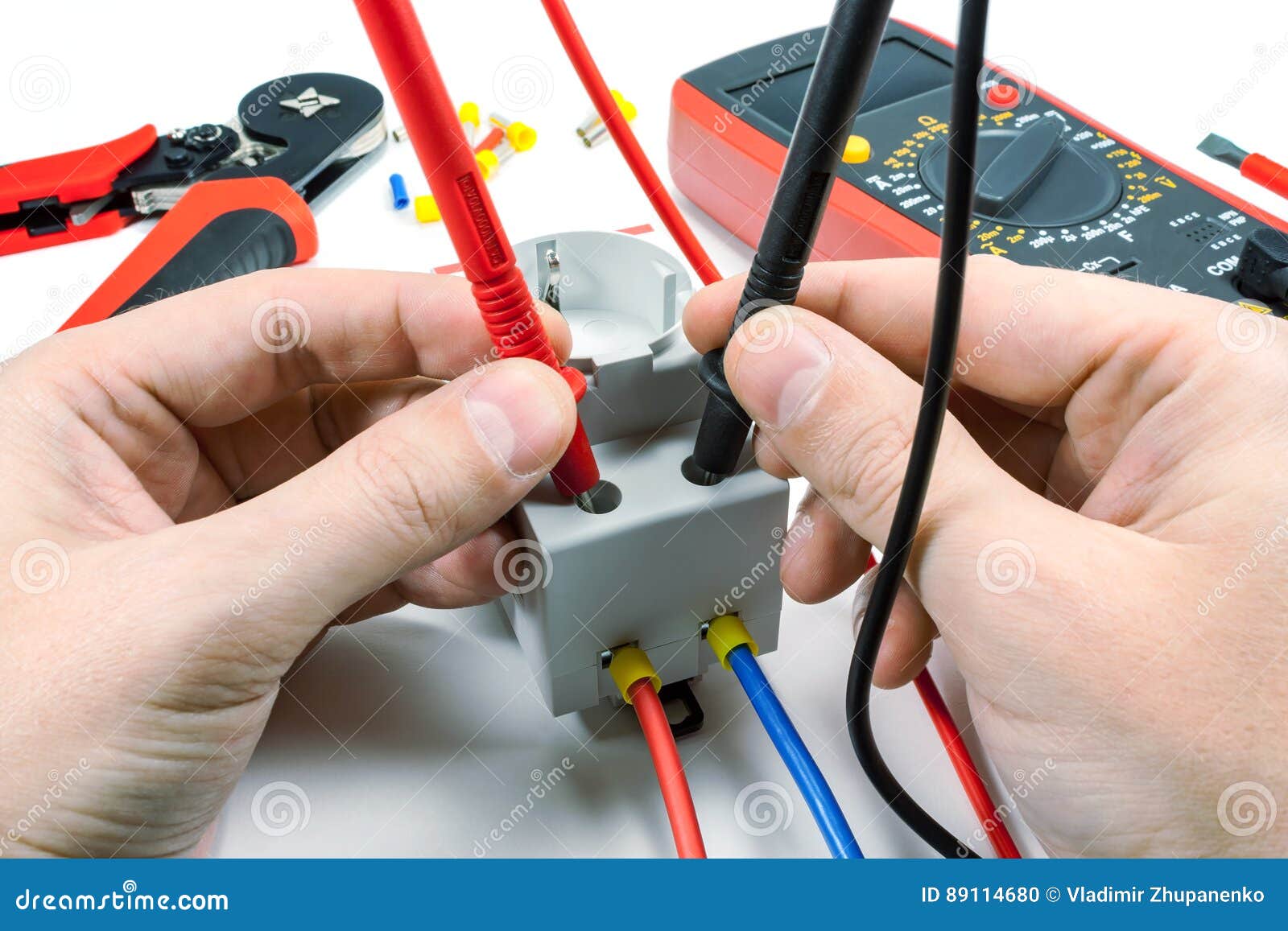 Measurement of Voltage in Electrical Outlet with a Multimeter on a ...