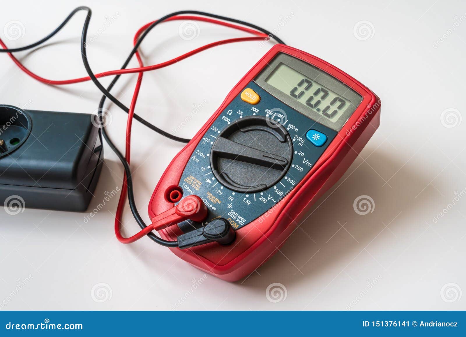 Measurement of Voltage in Electrical Socket - Digital Multimeter Stock ...