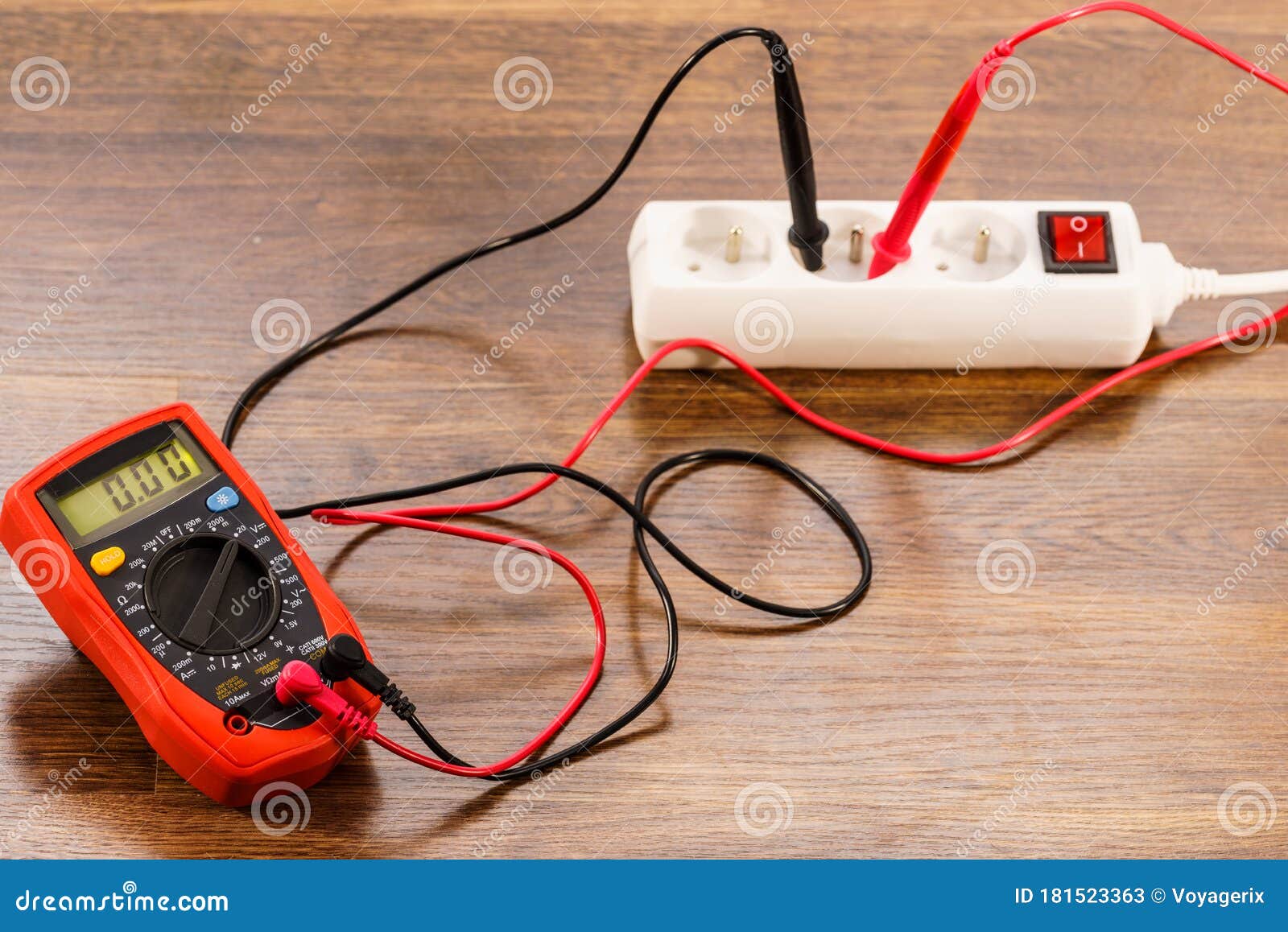 Measurement Voltage in Electrical Socket with Multimeter Stock Image ...