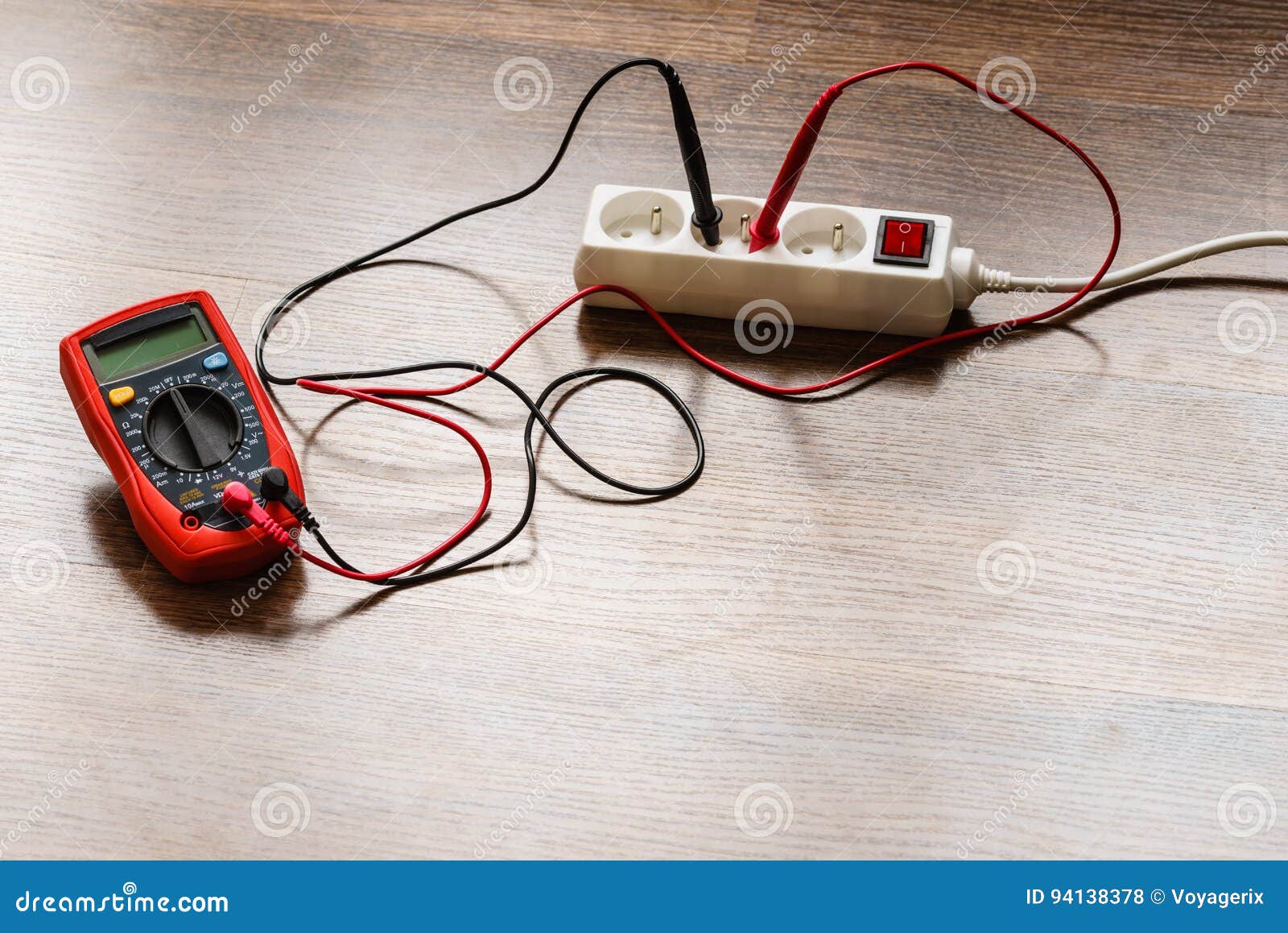 Measurement Voltage in Electrical Socket with Multimeter Stock Photo ...