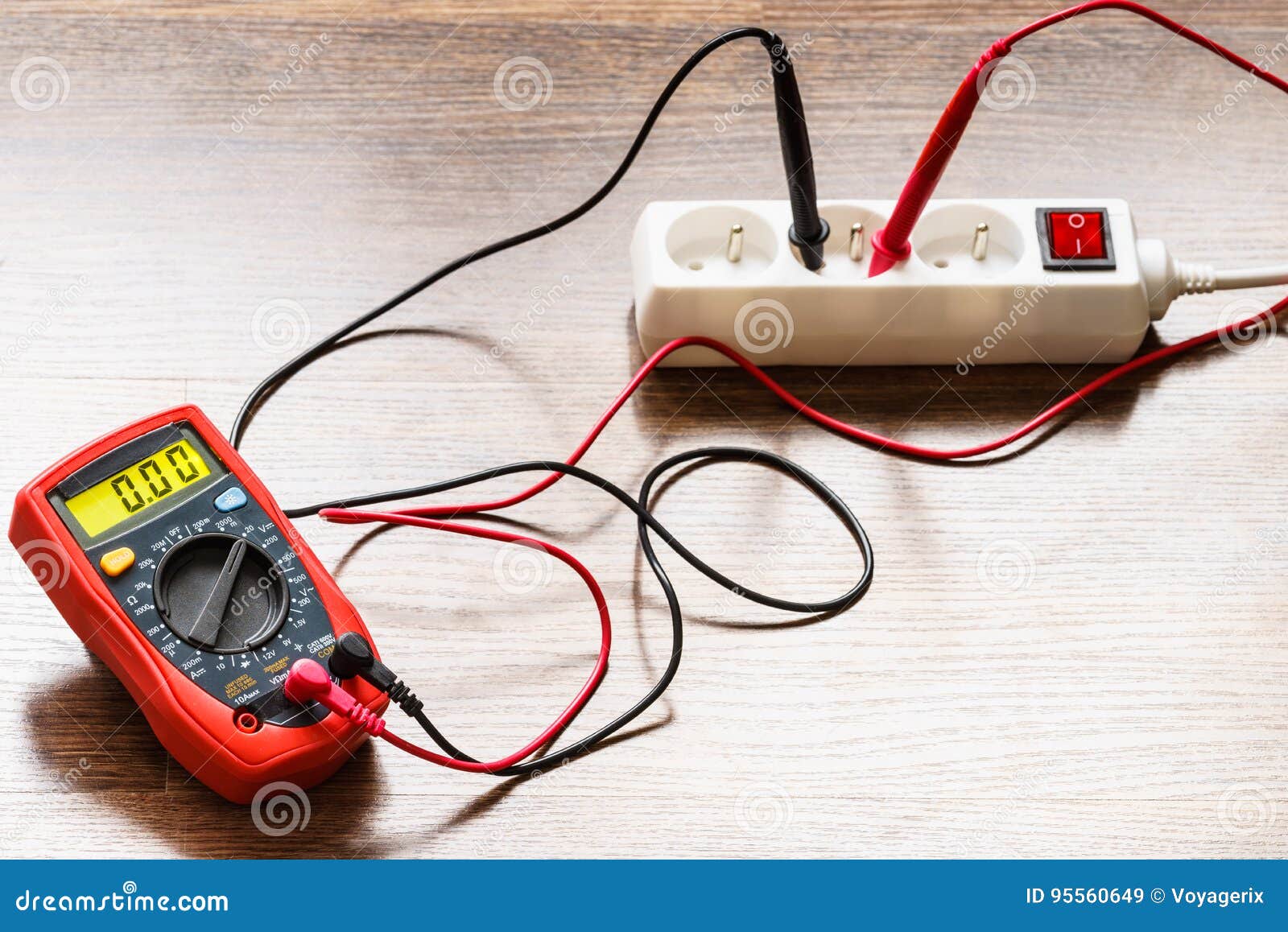 Measurement Voltage in Electrical Socket with Multimeter Stock Image ...