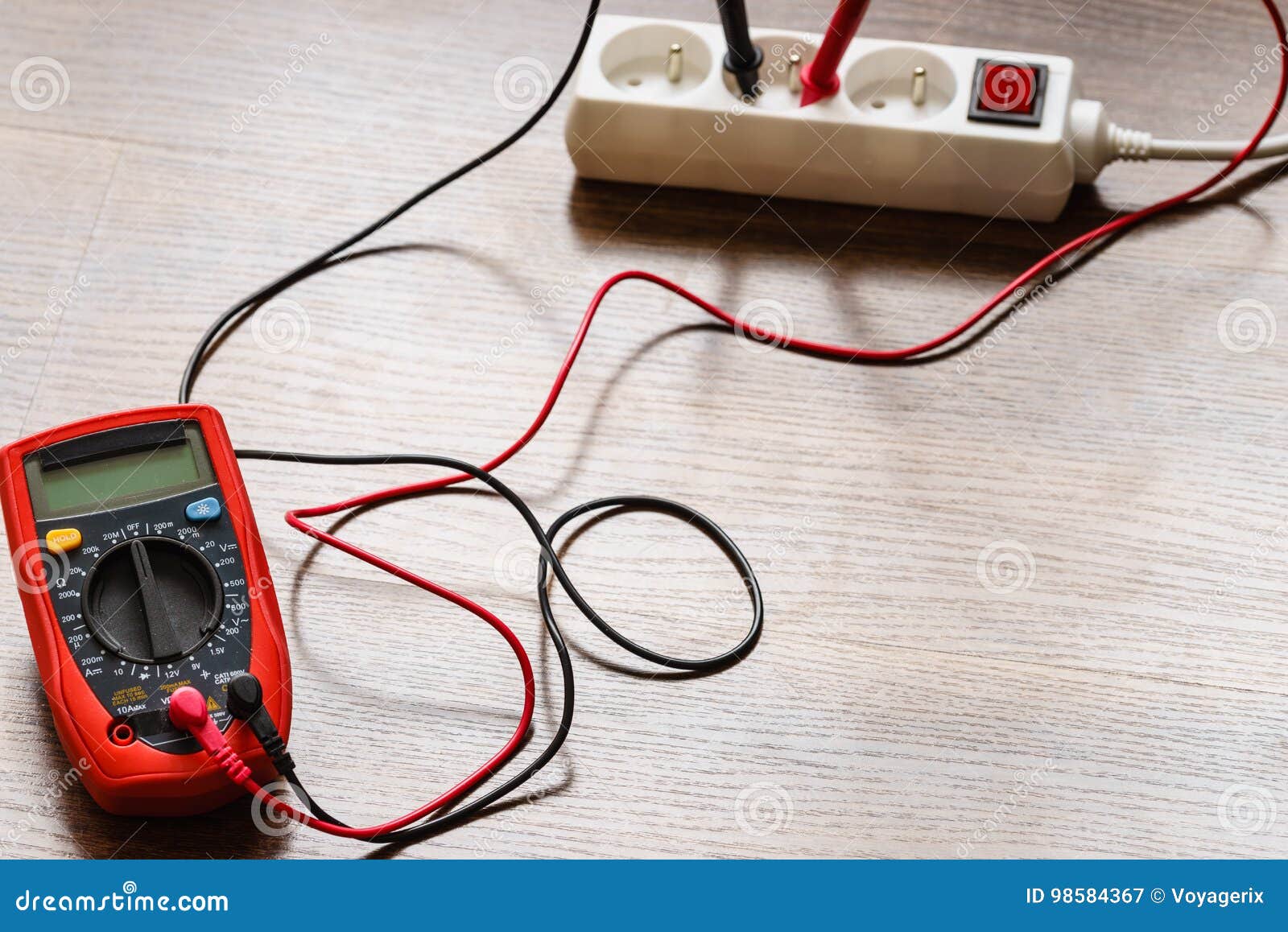 Measurement Voltage in Electrical Socket with Multimeter Stock Image ...