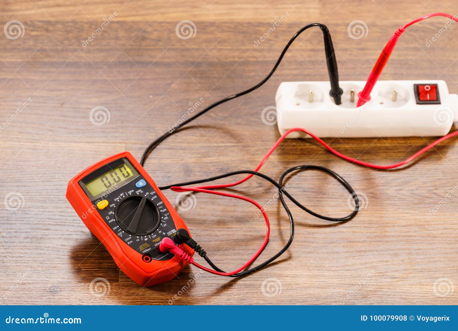 Measurement Voltage in Electrical Socket with Multimeter Stock Photo ...