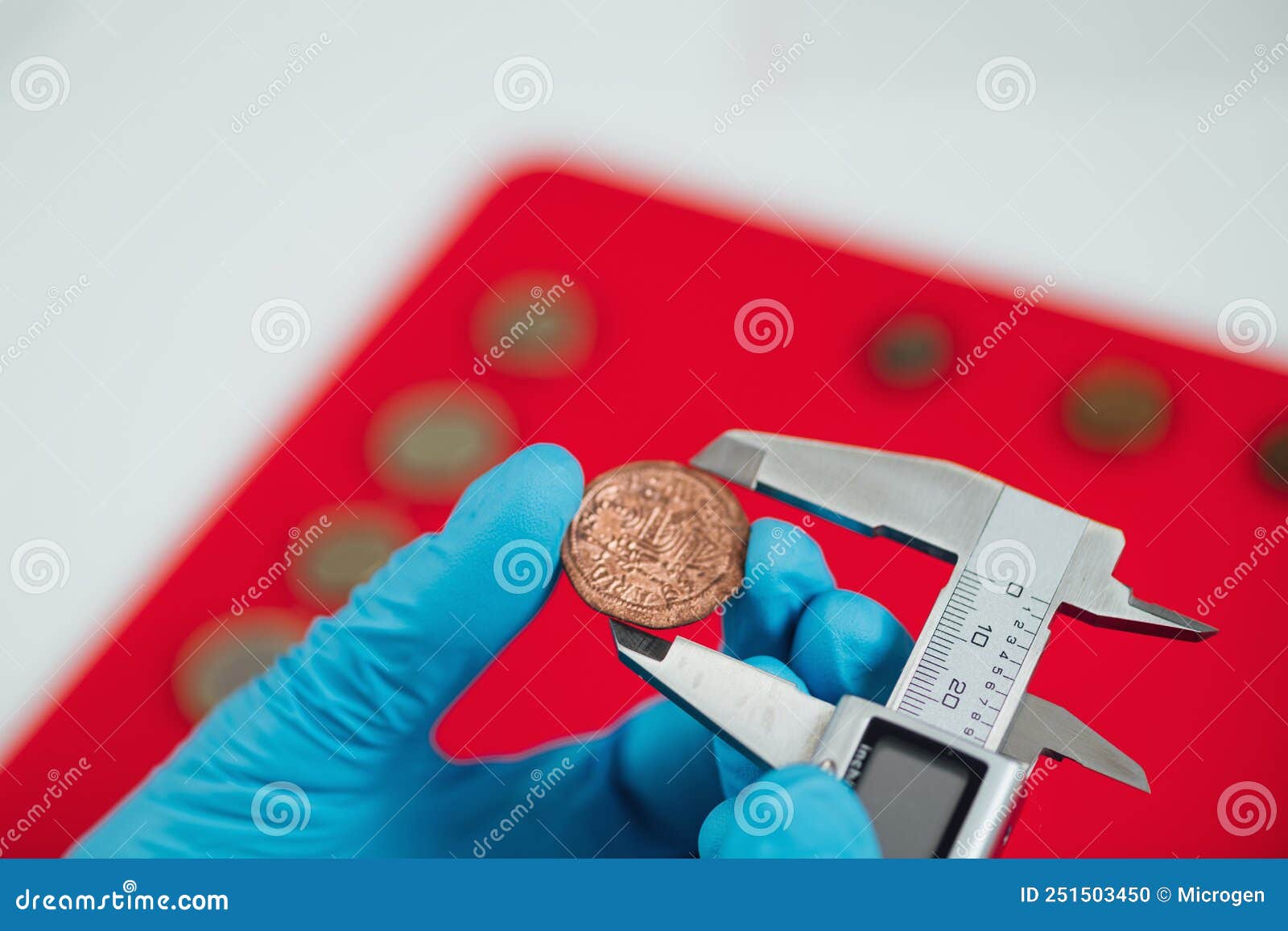 Measuring Ancient Coin Size with Caliper Stock Photo - Image of ancient ...