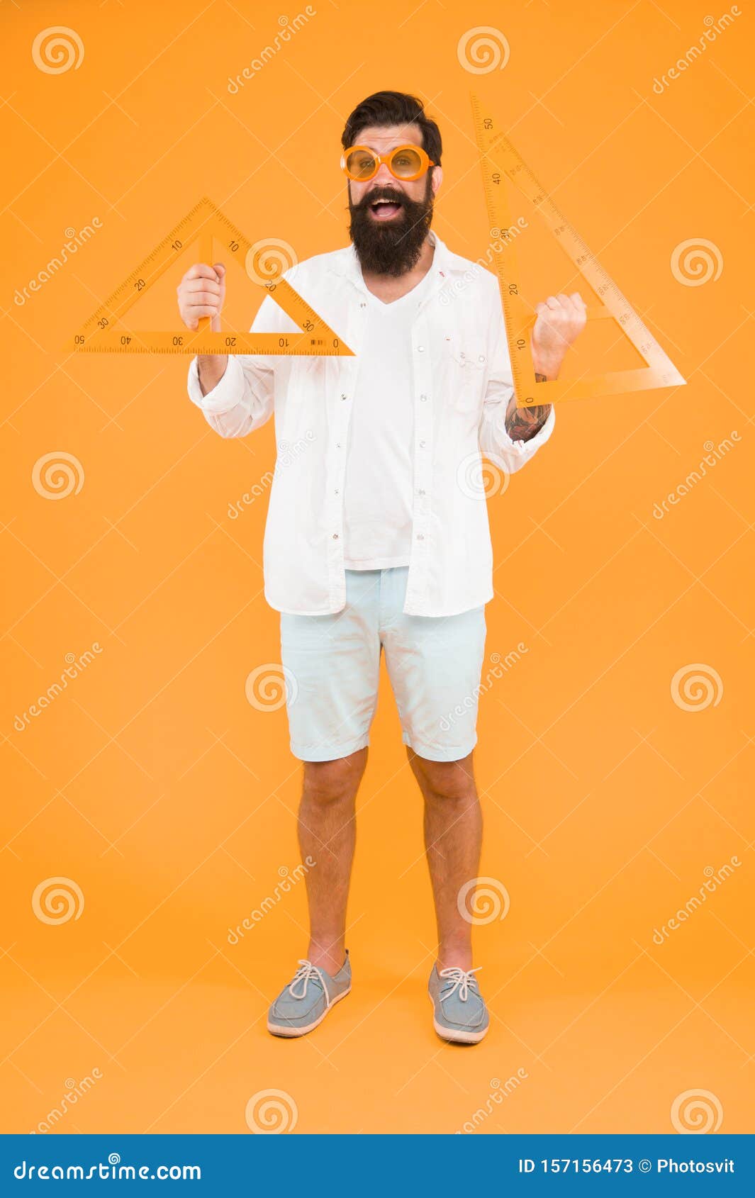 Measuring Angles at Geometry. Geometry Teacher Holding Triangles for ...