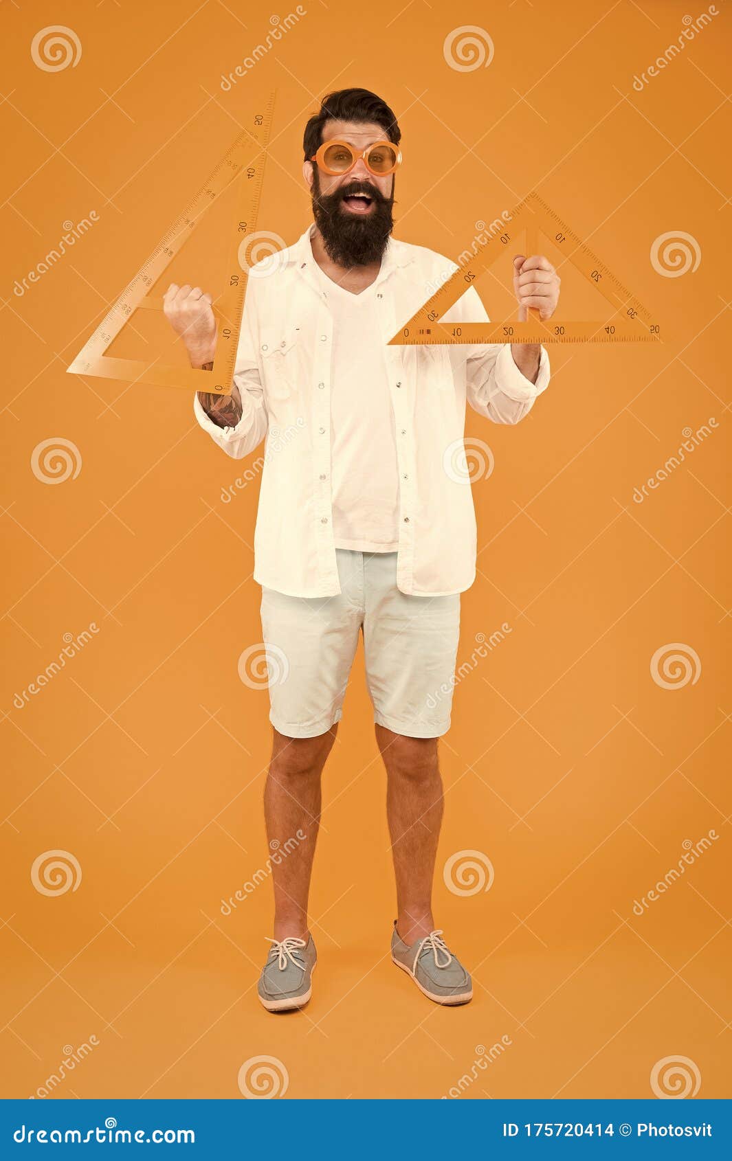 Measuring Angles at Geometry. Geometry Teacher Holding Triangles for ...