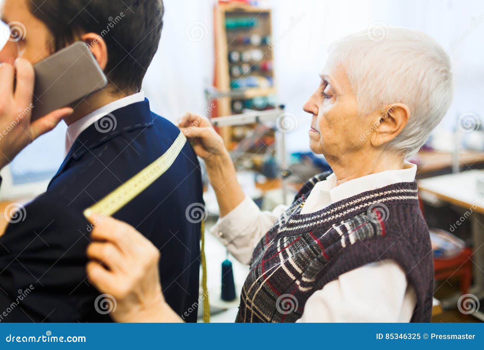 Measuring back width stock image. Image of occupation - 85346325