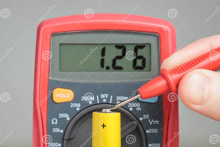 Measuring Battery Voltage with Multimeter Stock Image - Image of ...