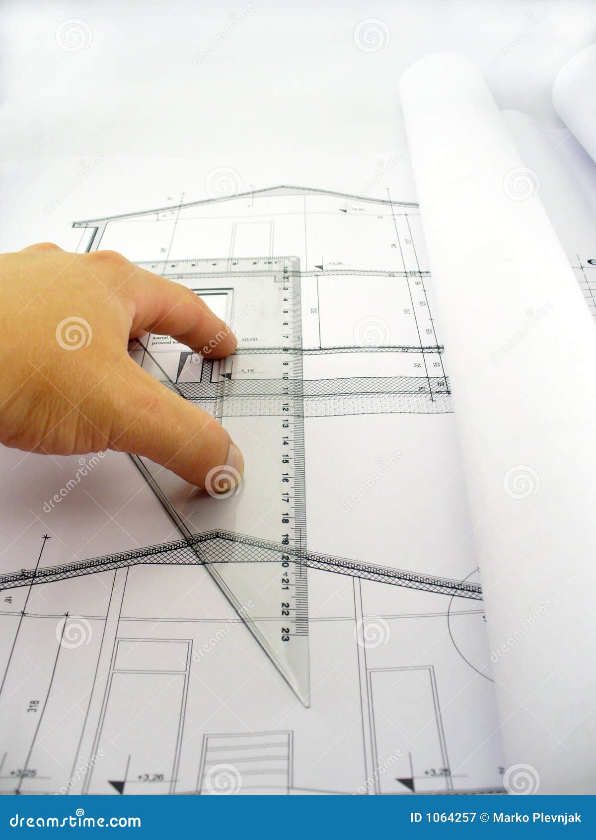 Measuring on blueprints stock image. Image of designing - 1064257