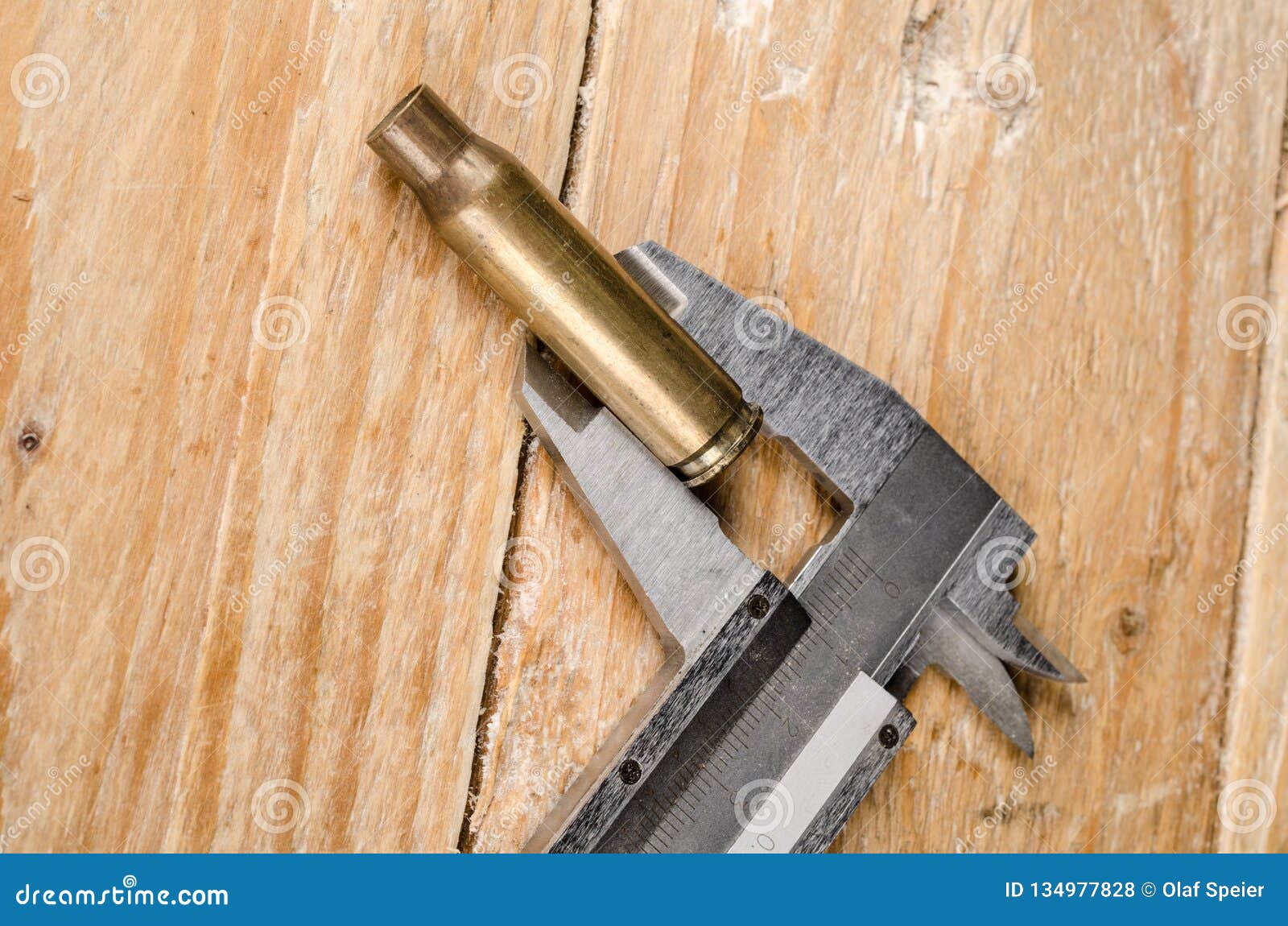 Measuring a bullet stock photo. Image of measurement - 134977828