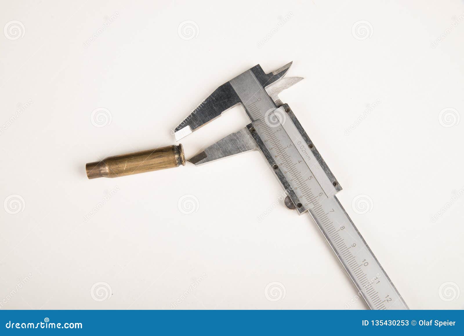 Measuring a bullet stock image. Image of ammo, ammunition - 135430253