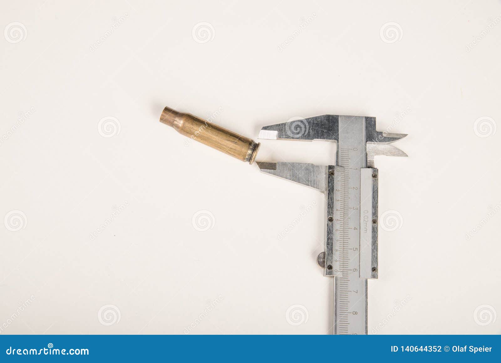 Measuring a bullet stock photo. Image of kill, measurement - 140644352