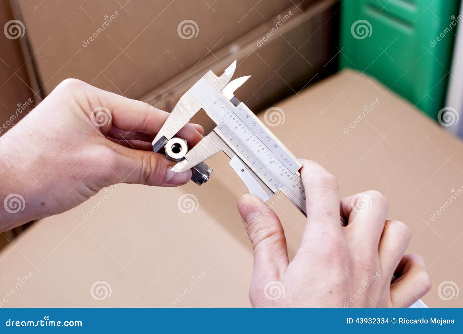 Measuring with Caliper stock photo. Image of tool, instrument - 43932334
