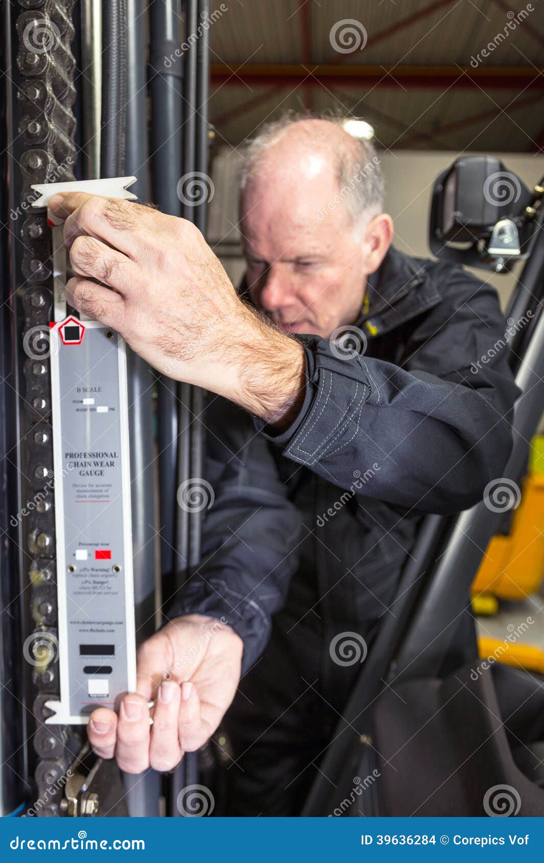 Measuring the chain. stock photo. Image of forklift, professional ...
