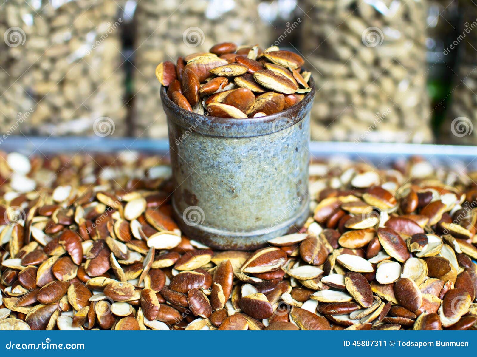 A Measuring Container Filled with Beans Surrounded by Beans Stock Image ...