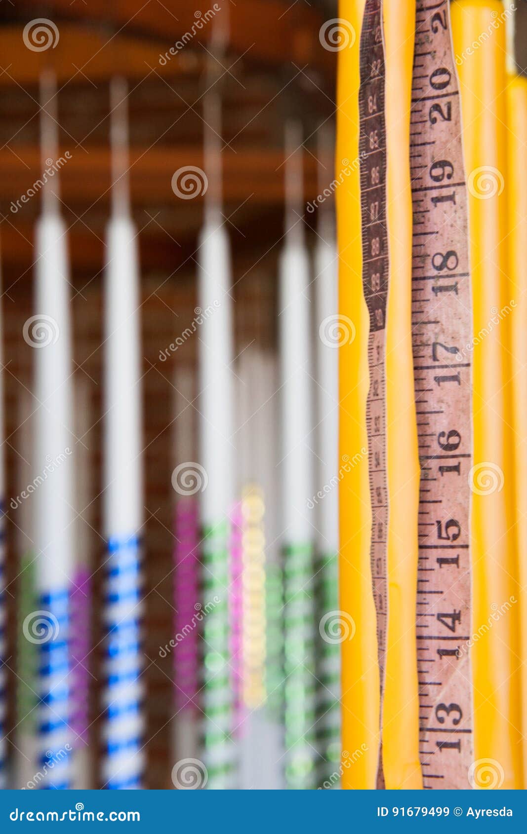 Measuring crafted candles stock image. Image of makers - 91679499