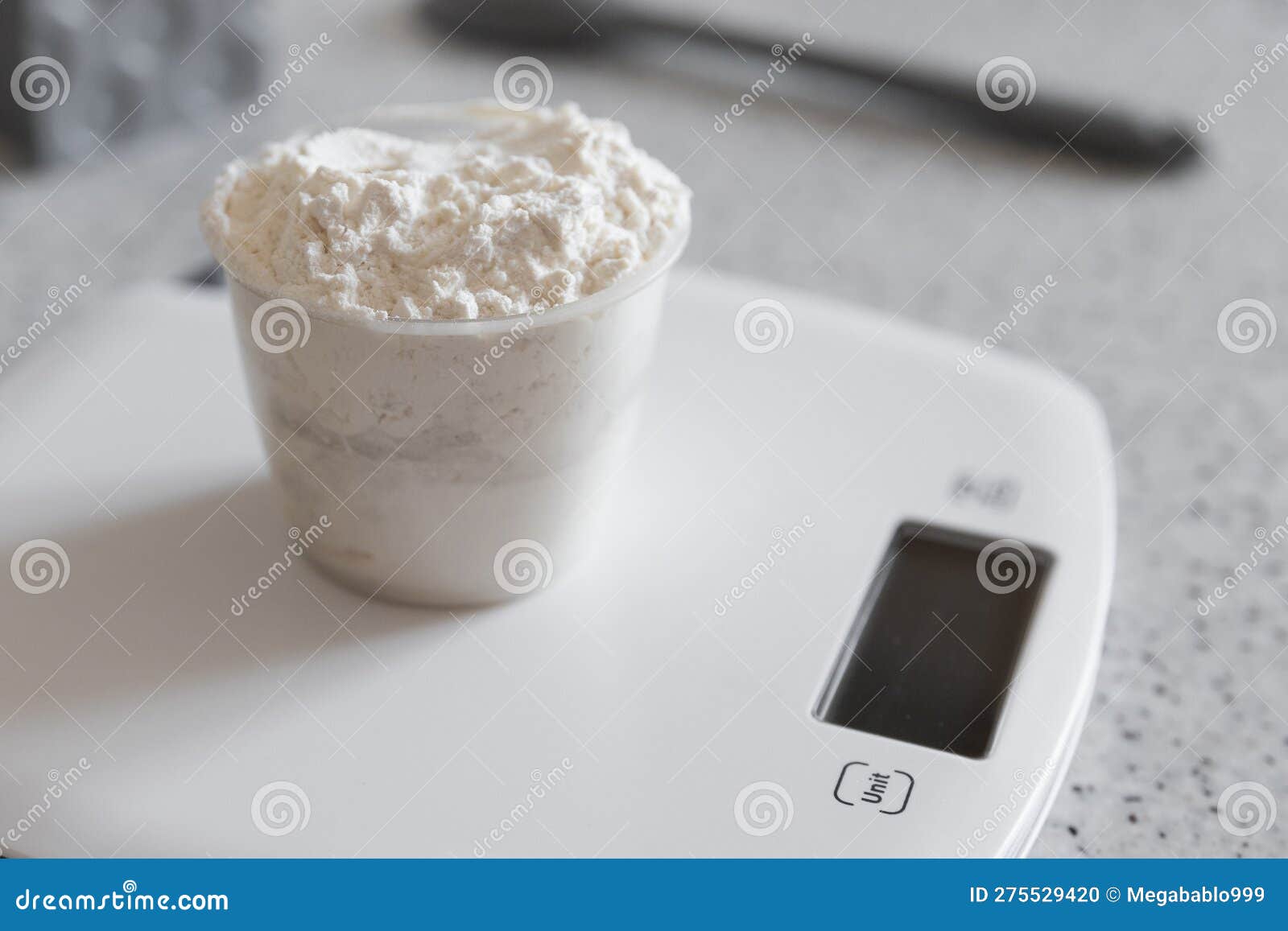 Measuring Cup with Flour on a White Kitchen Scale Stock Photo - Image ...