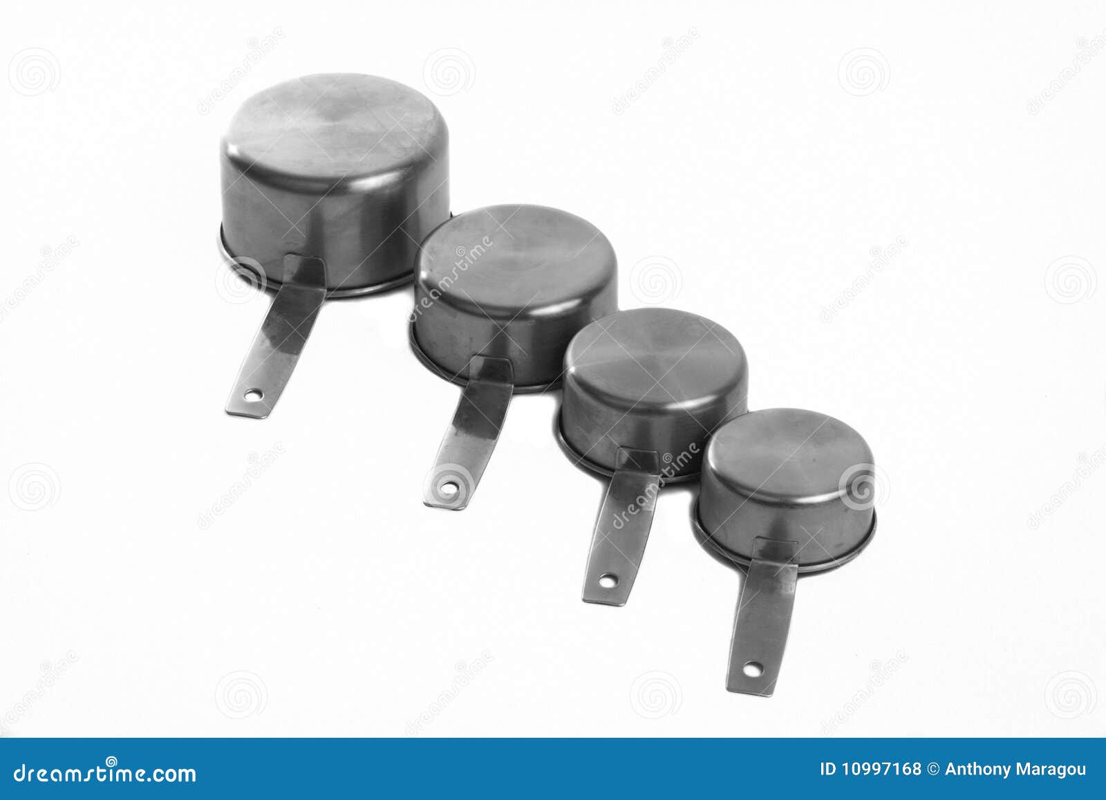 Measuring Cups Aligned at an Angle Stock Photo - Image of cups, third ...