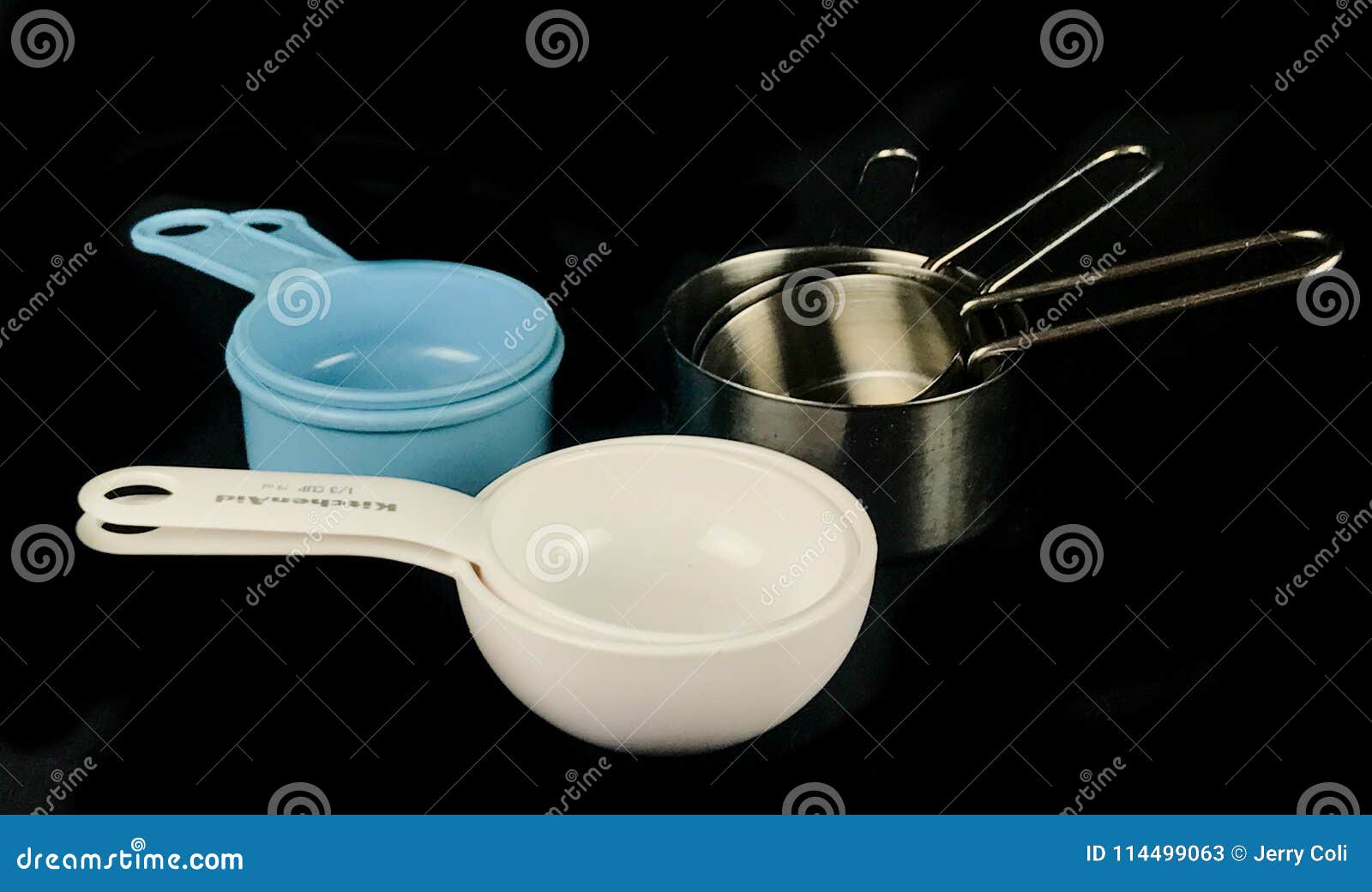 Measuring Cups on Black Backdrop Editorial Stock Photo - Image of ...