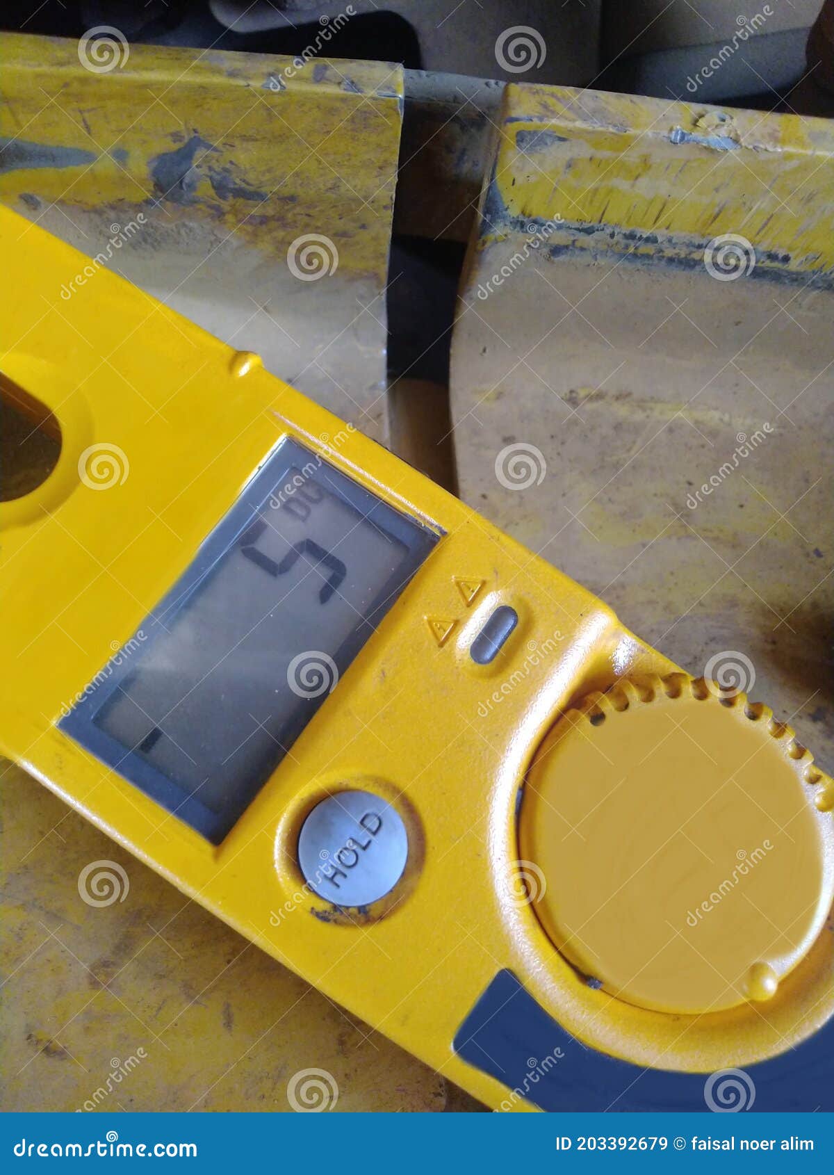 Measuring the Current with Yellow Multimeter Stock Image - Image of ...