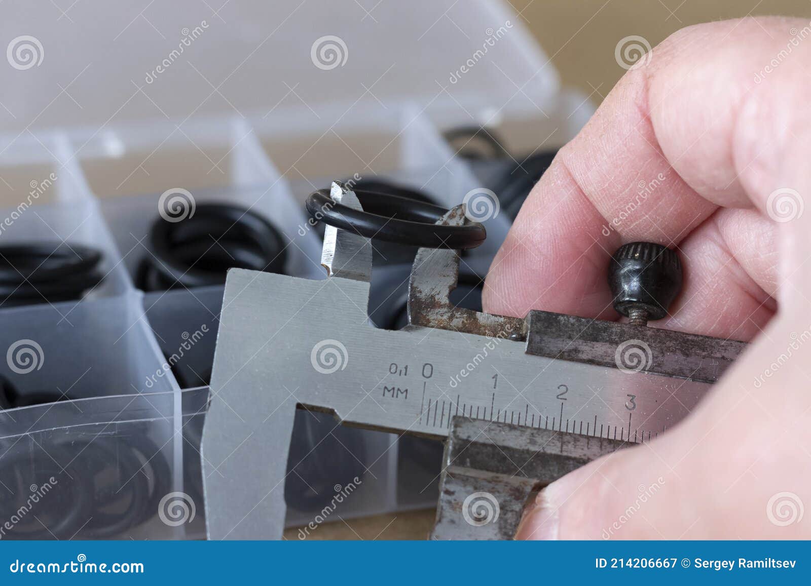 Measuring the Diameter of the Rubber O-ring with a Caliper. Stock Image ...