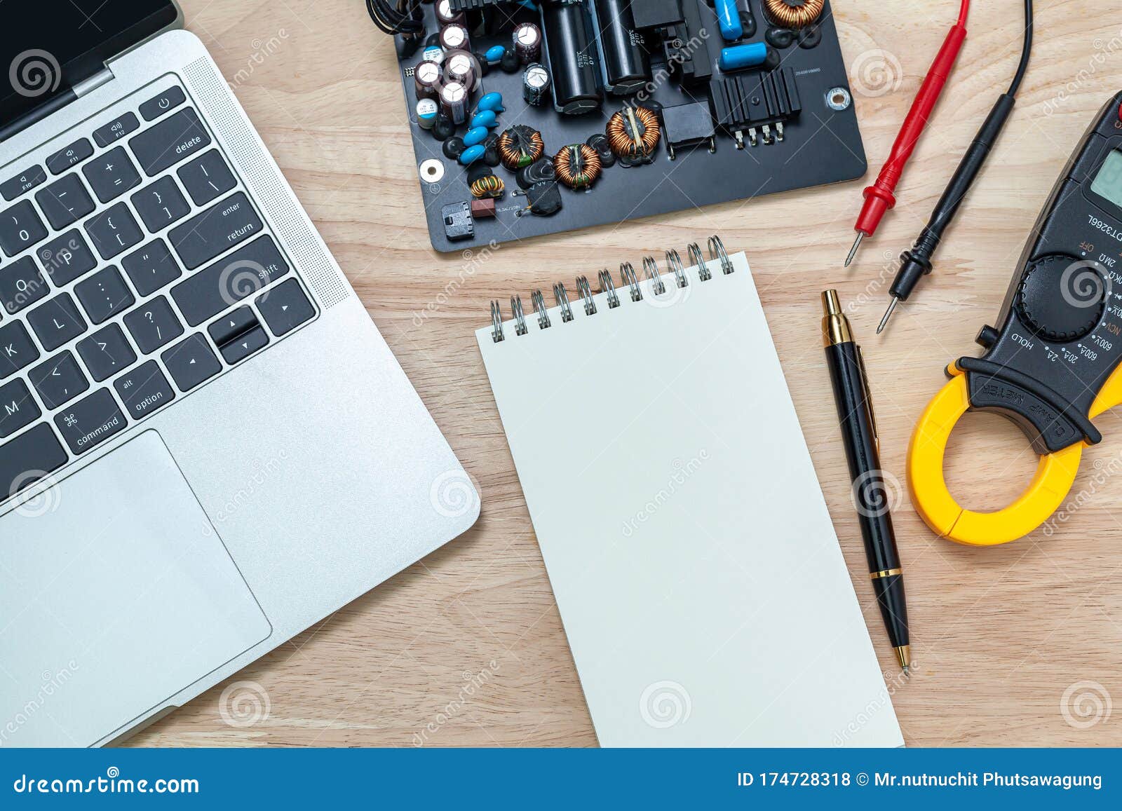 Measuring the Electronic Components on the Motherboard of the Computer ...