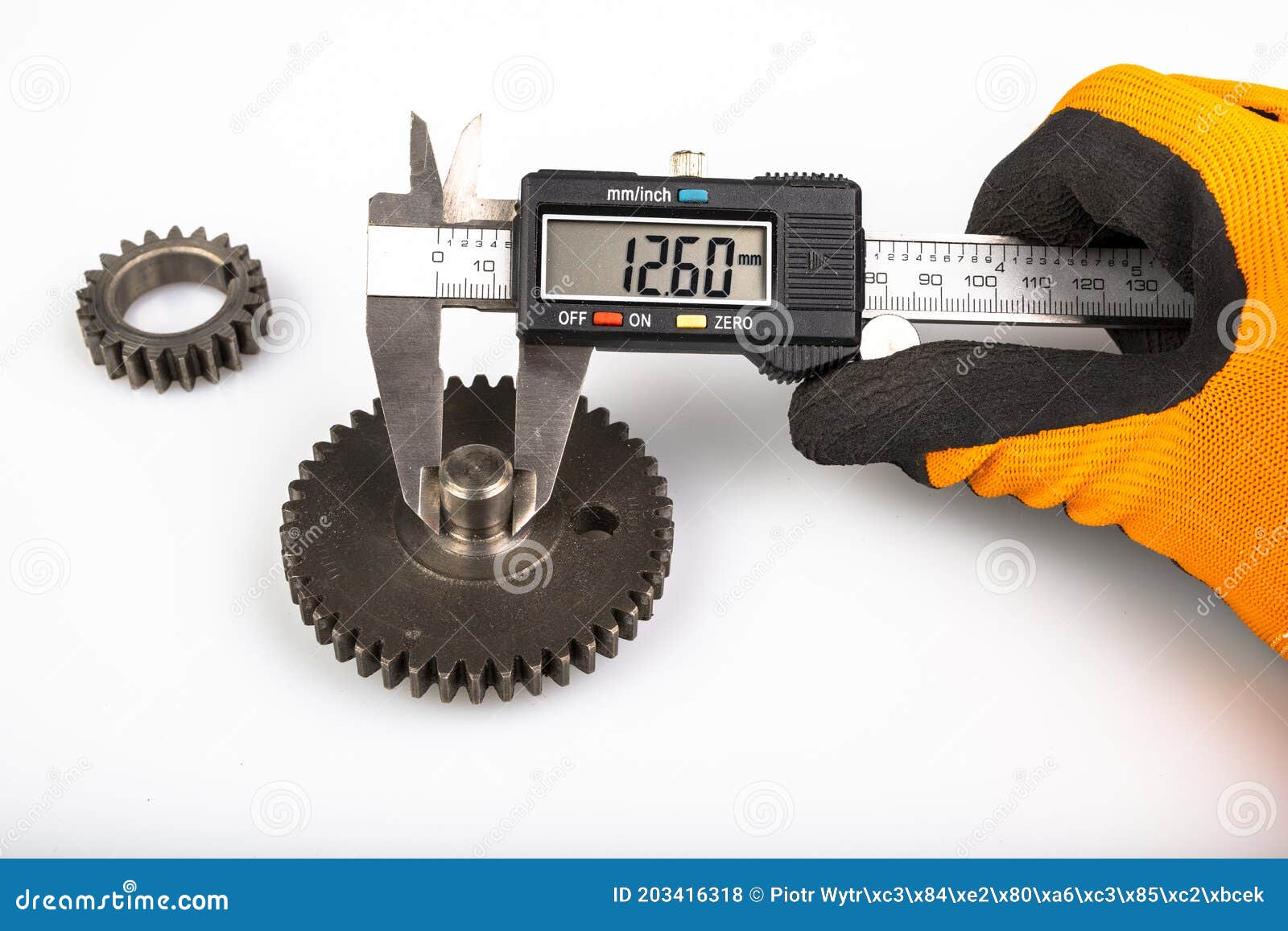 Measuring The Gears With A Caliper. Engineering Work In The Laboratory ...