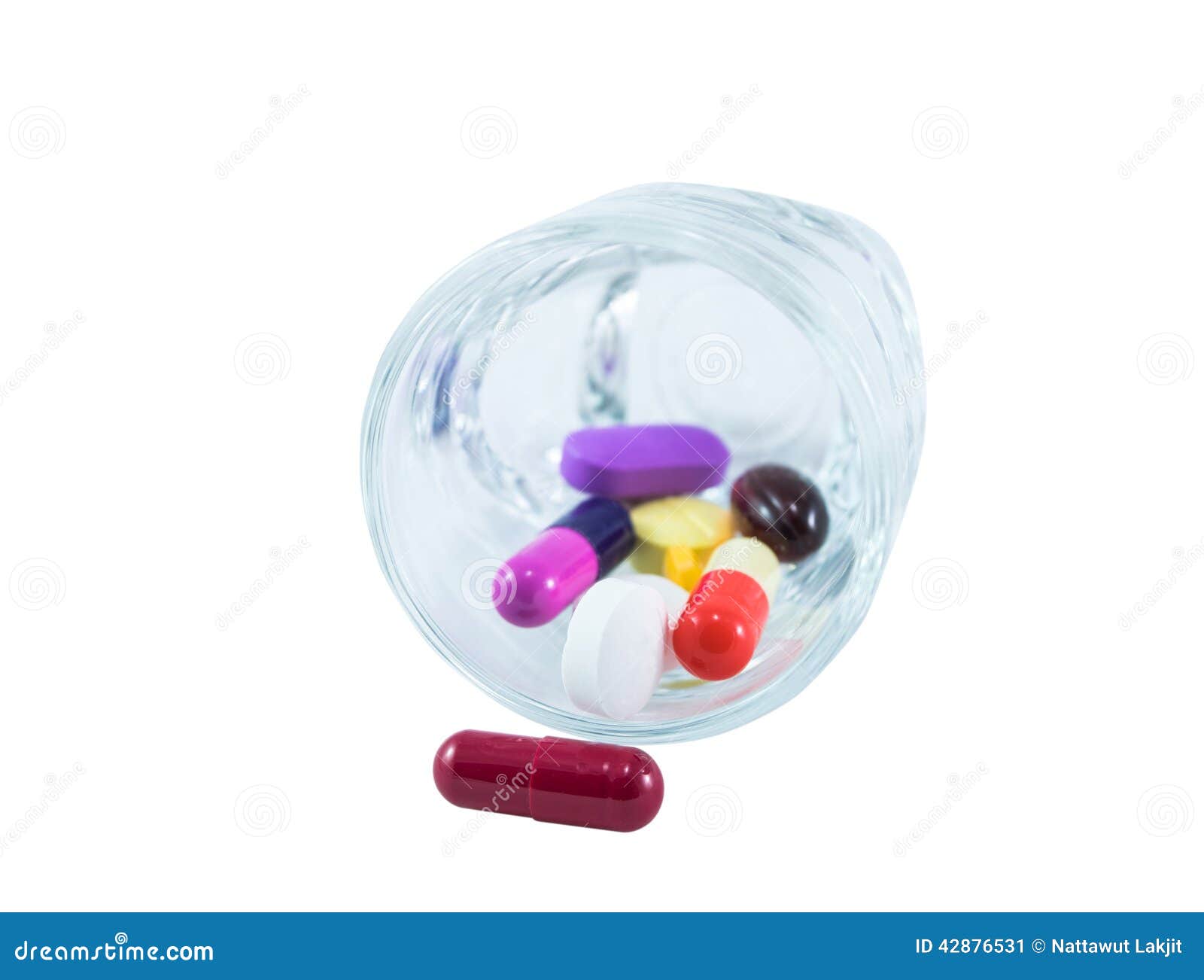 Measuring Glass With Capsules And Tablets Royalty-Free Stock Photo ...