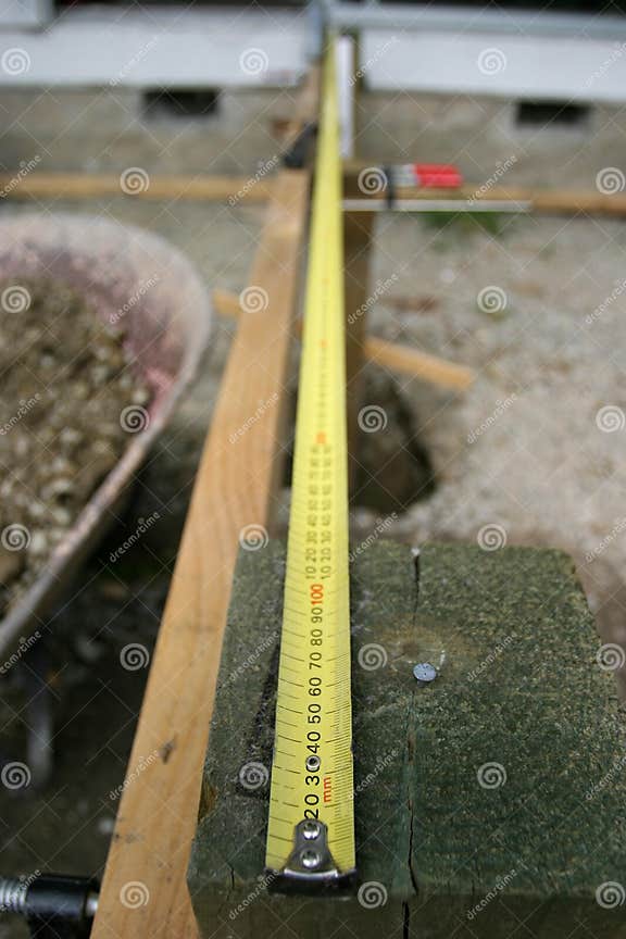 Measuring the job stock image. Image of construction, foundation - 1565827