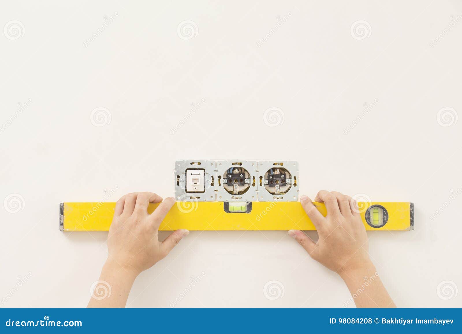 Measuring the Level of Electrical Outlets Stock Photo - Image of ...