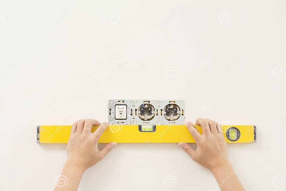 Measuring the Level of Electrical Outlets Stock Photo - Image of ...