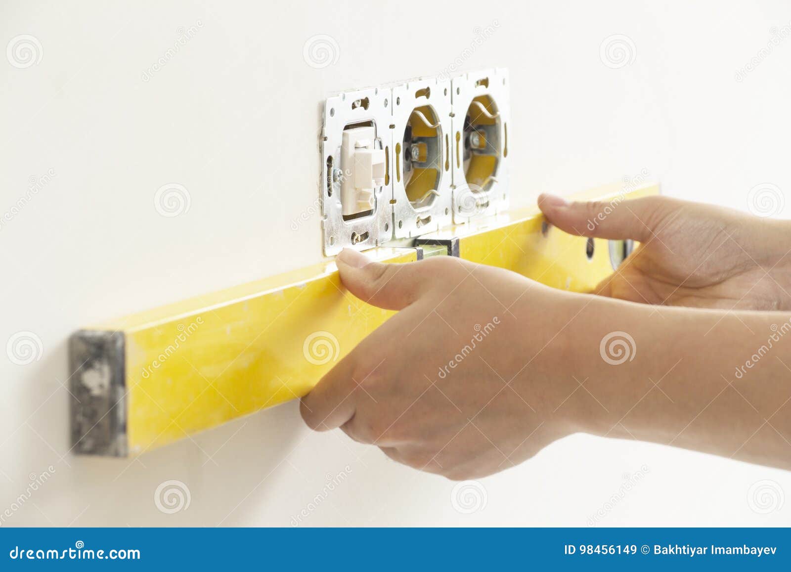 Measuring the Level of Electrical Outlets Stock Image - Image of ...