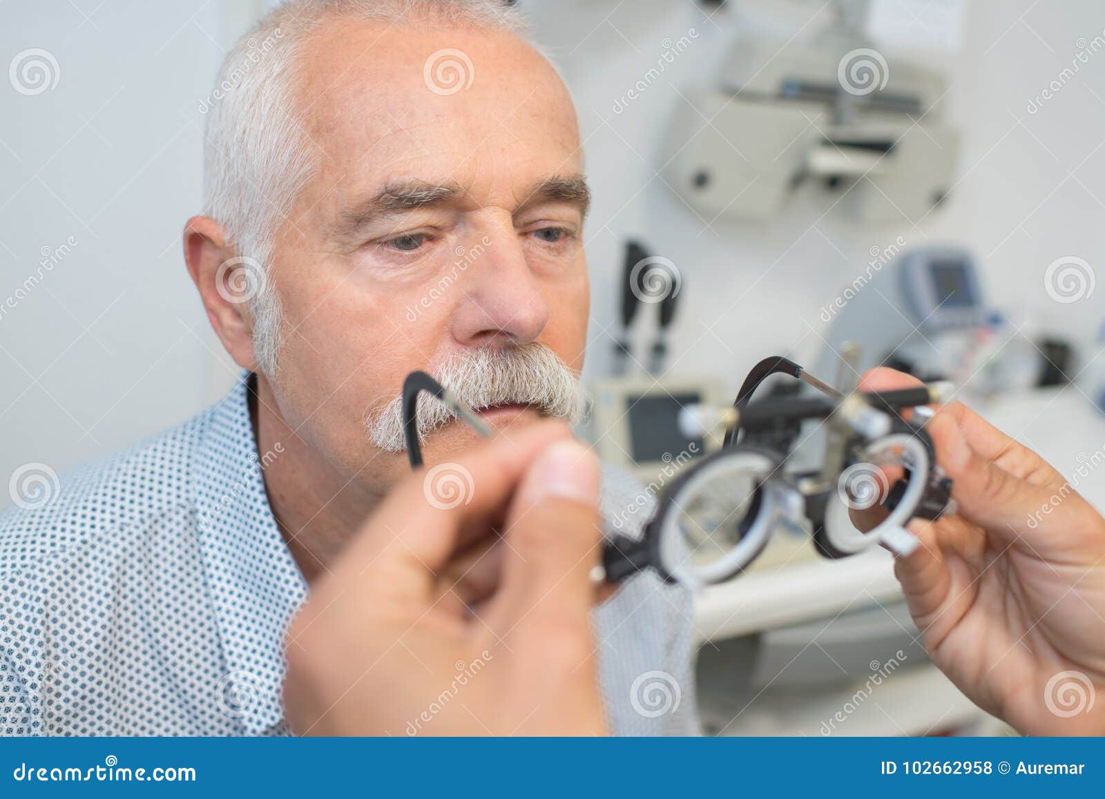 Measuring old mans vision stock photo. Image of doctor - 102662958