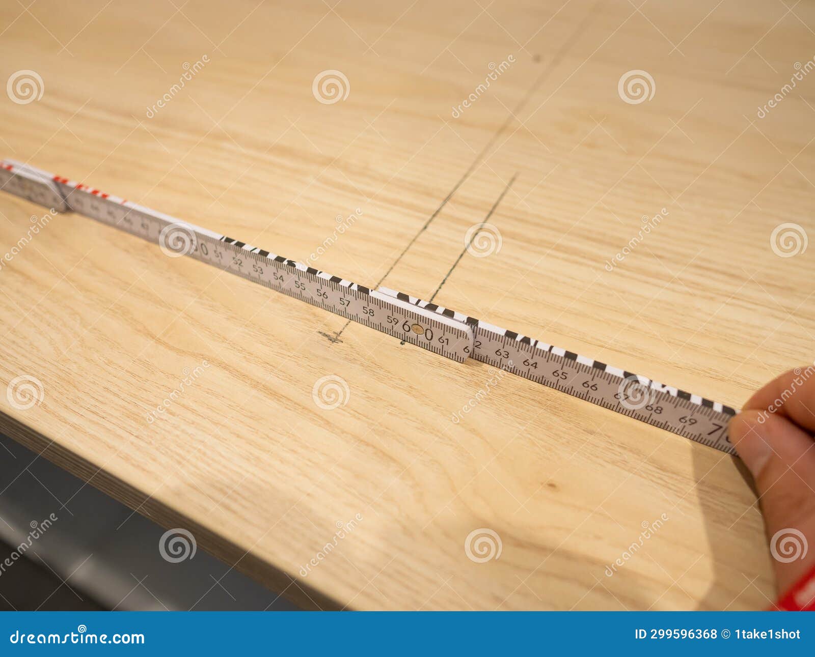 Measuring the Position with a Folding Ruler Stock Photo - Image of ...