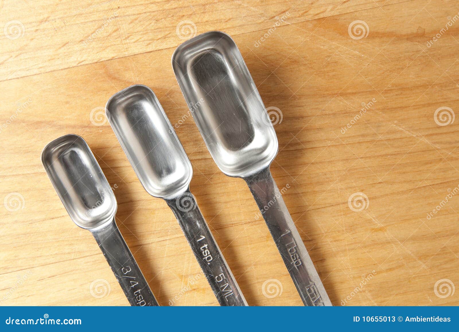 Measuring Spoons on Wood Counter Stock Image - Image of cutting, recipe ...