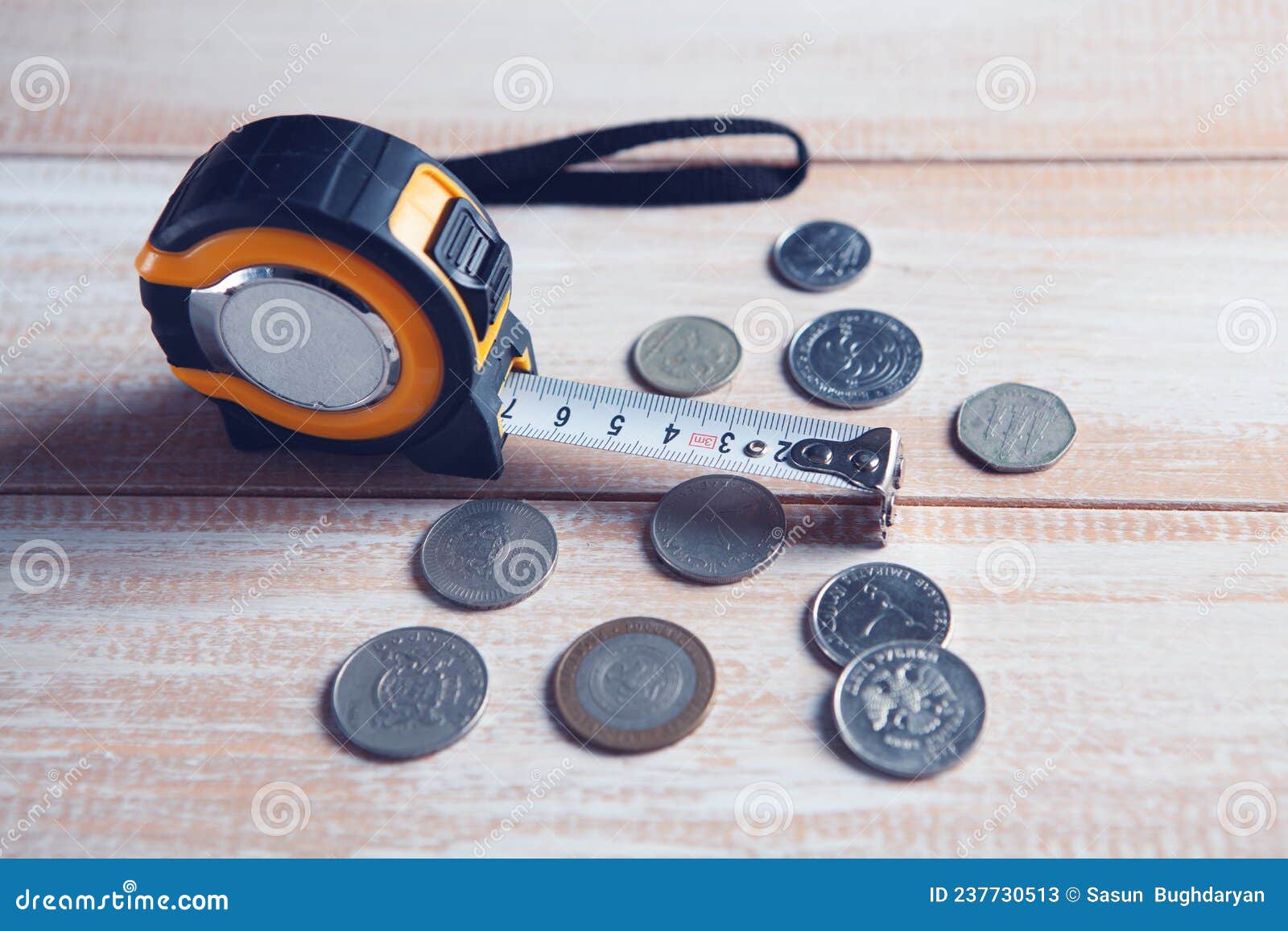 Measuring Tape and Coins on the Table Stock Image - Image of measuring ...