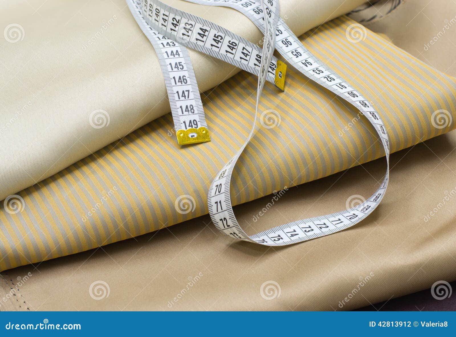 Measuring Tape on Fabric stock photo. Image of measuring - 42813912