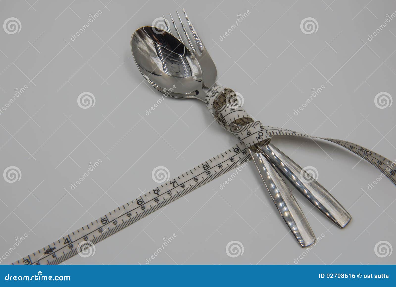 Measuring Tape with Fork and Spoon Isolated on White Background Stock ...